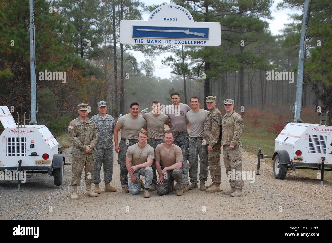 The group of new Expert Infantryman Badge holders pose for a photos ...