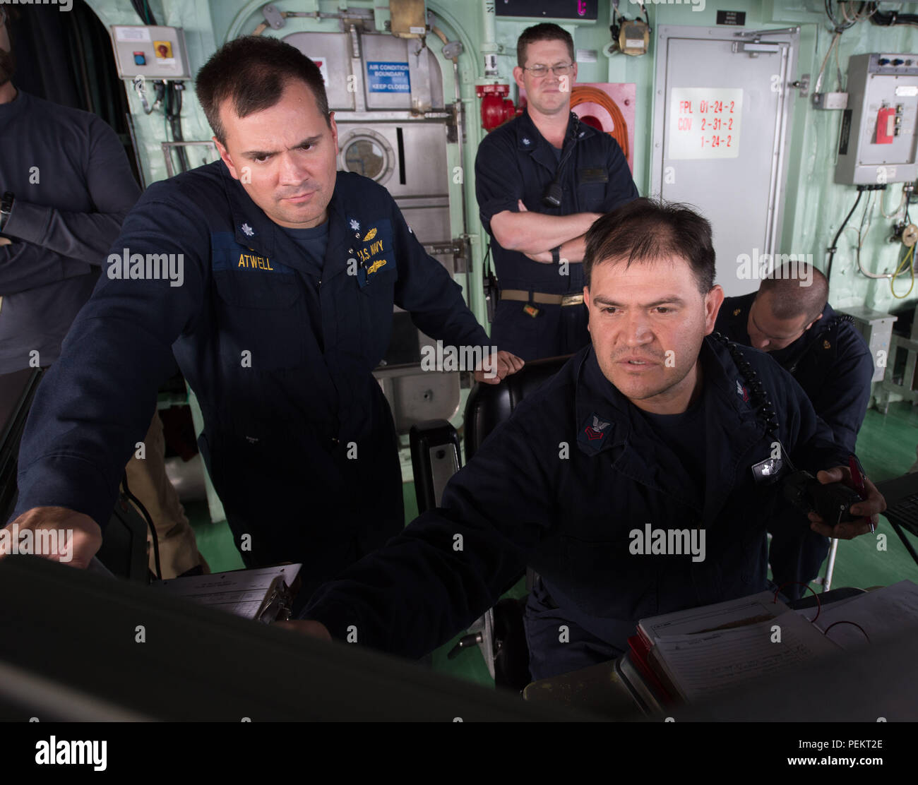 SOUTH CHINA SEA – (Dec. 16, 2015) – Cmdr. Michael Atwell, commanding ...