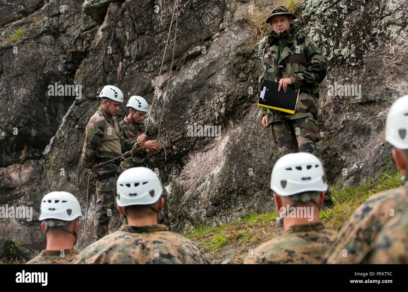 Commando climbing rock hi-res stock photography and images - Alamy