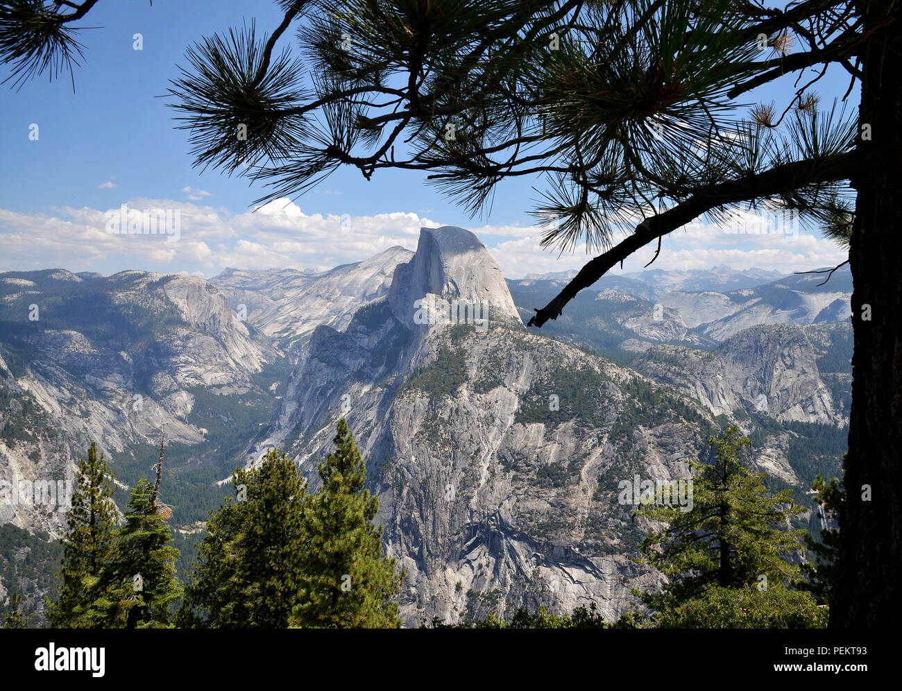 Tourists view Half Dome mountain in Yosemite National Park, California ...