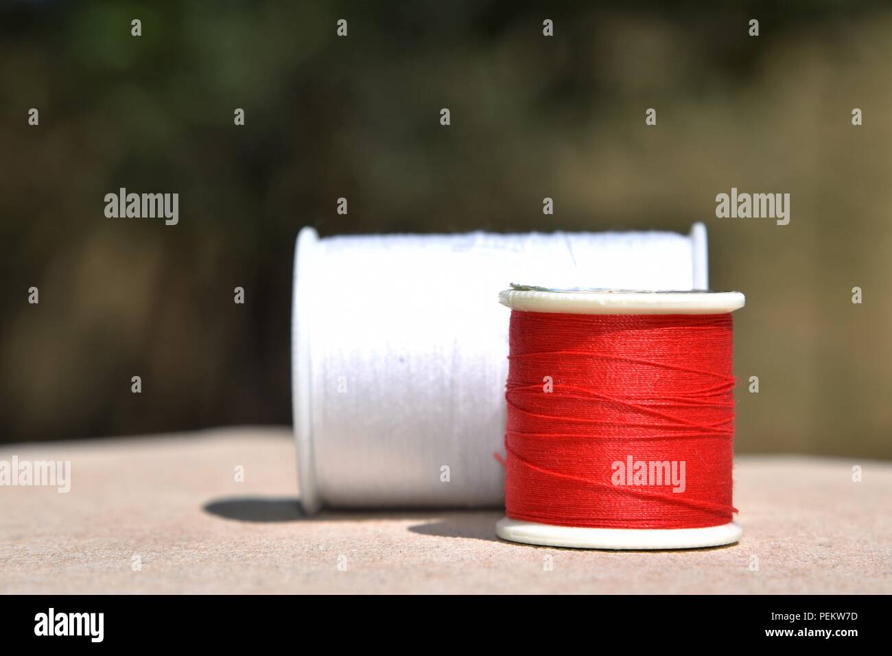 White spools hi-res stock photography and images - Alamy
