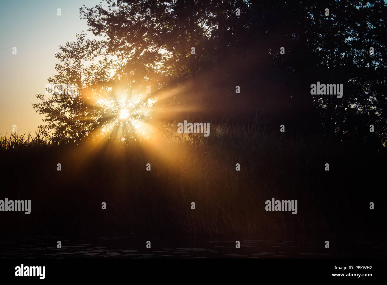 Sun rays sunrise sunbeam hi-res stock photography and images - Alamy