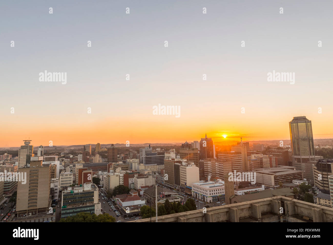 A sunset is seen of the cityscape of Harare, Zimbabwe Stock Photo - Alamy