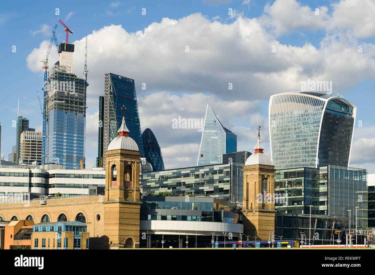 View of the city of London buildings from Southwark Bridge with Cannon ...