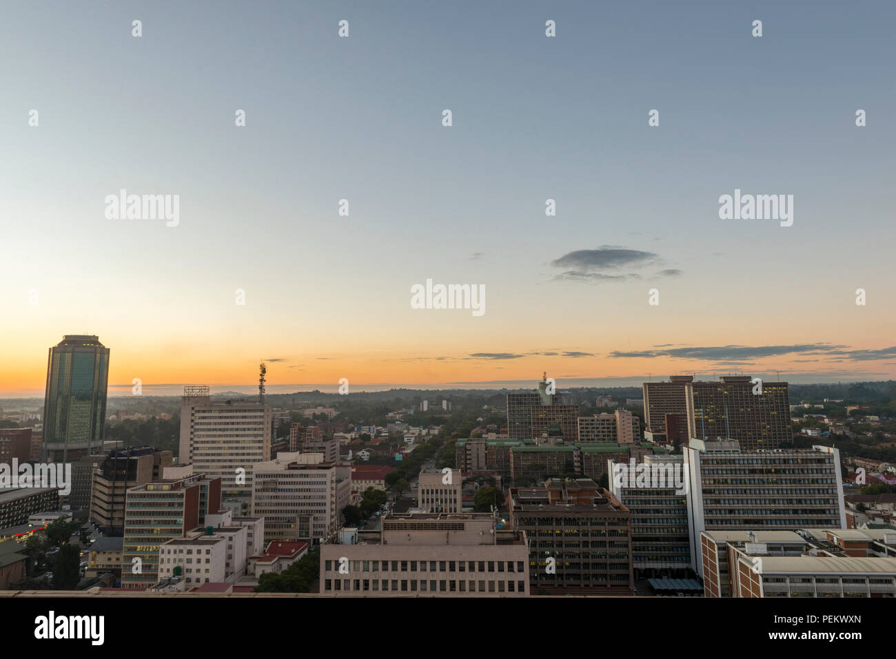A sunset is seen of the cityscape of Harare, Zimbabwe Stock Photo - Alamy