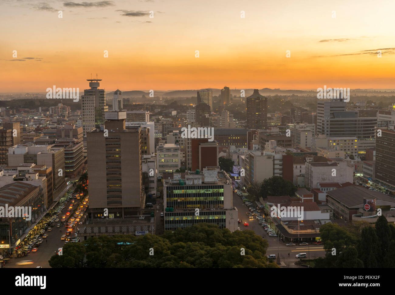 A sunset is seen of the cityscape of Harare, Zimbabwe Stock Photo - Alamy