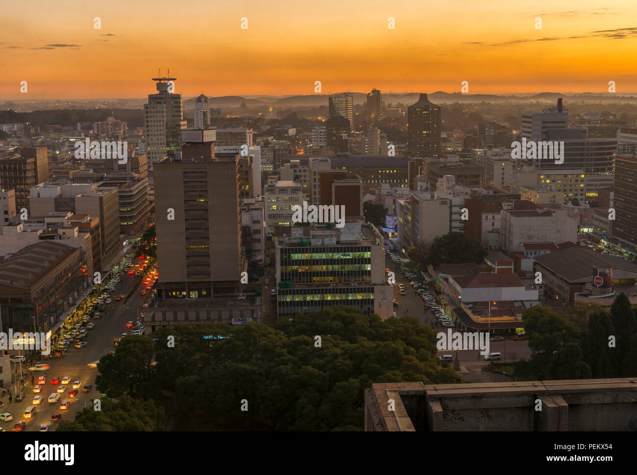 A sunset is seen of the cityscape of Harare, Zimbabwe Stock Photo - Alamy