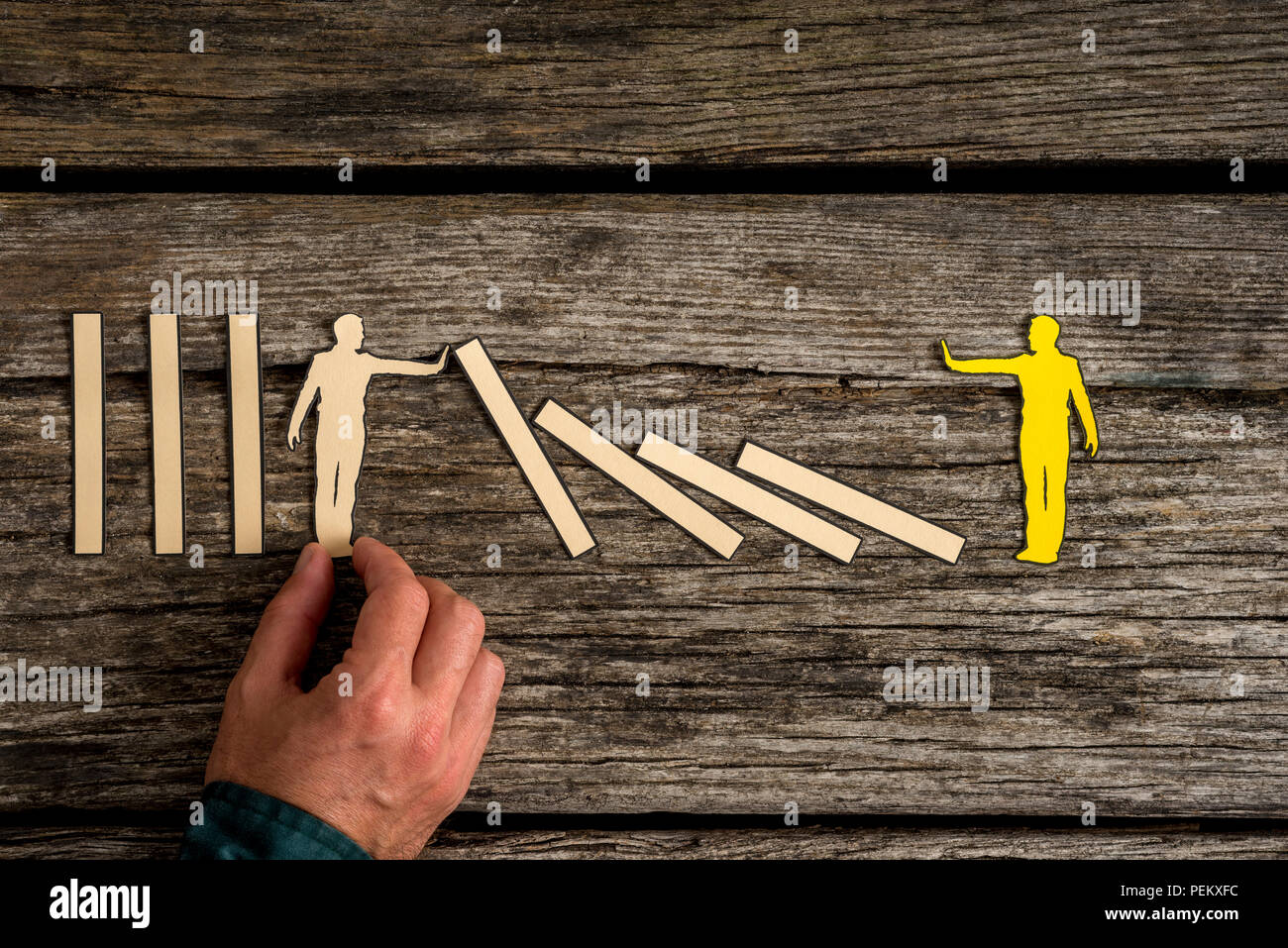 Unidentifiable adult man using his hand and carefully positioning small ...