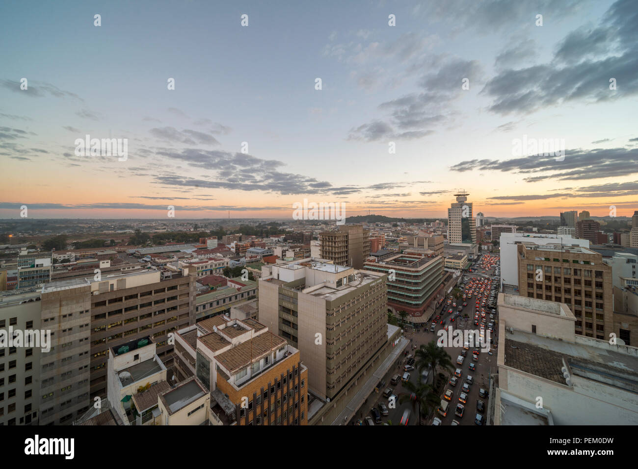 A sunset is seen of the cityscape of Harare, Zimbabwe Stock Photo - Alamy