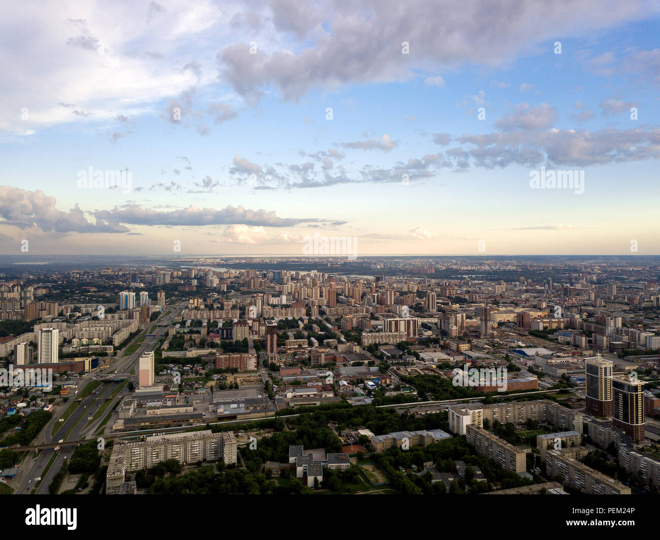 Aerial view of old and new buildings in the city with skyscrapers ...