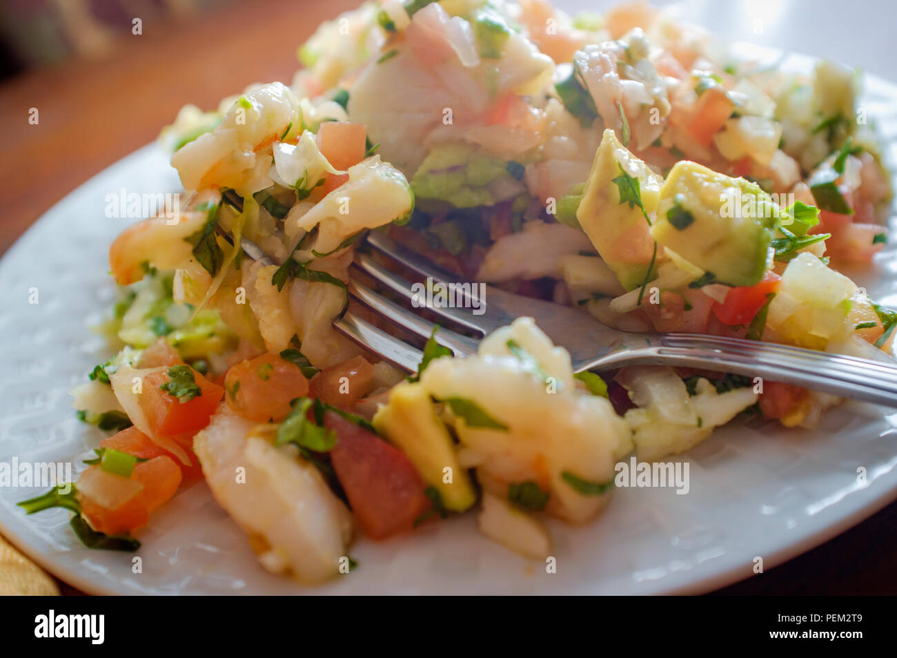 Chilled spicy Peruvian ceviche with crab and shrimp Stock Photo - Alamy