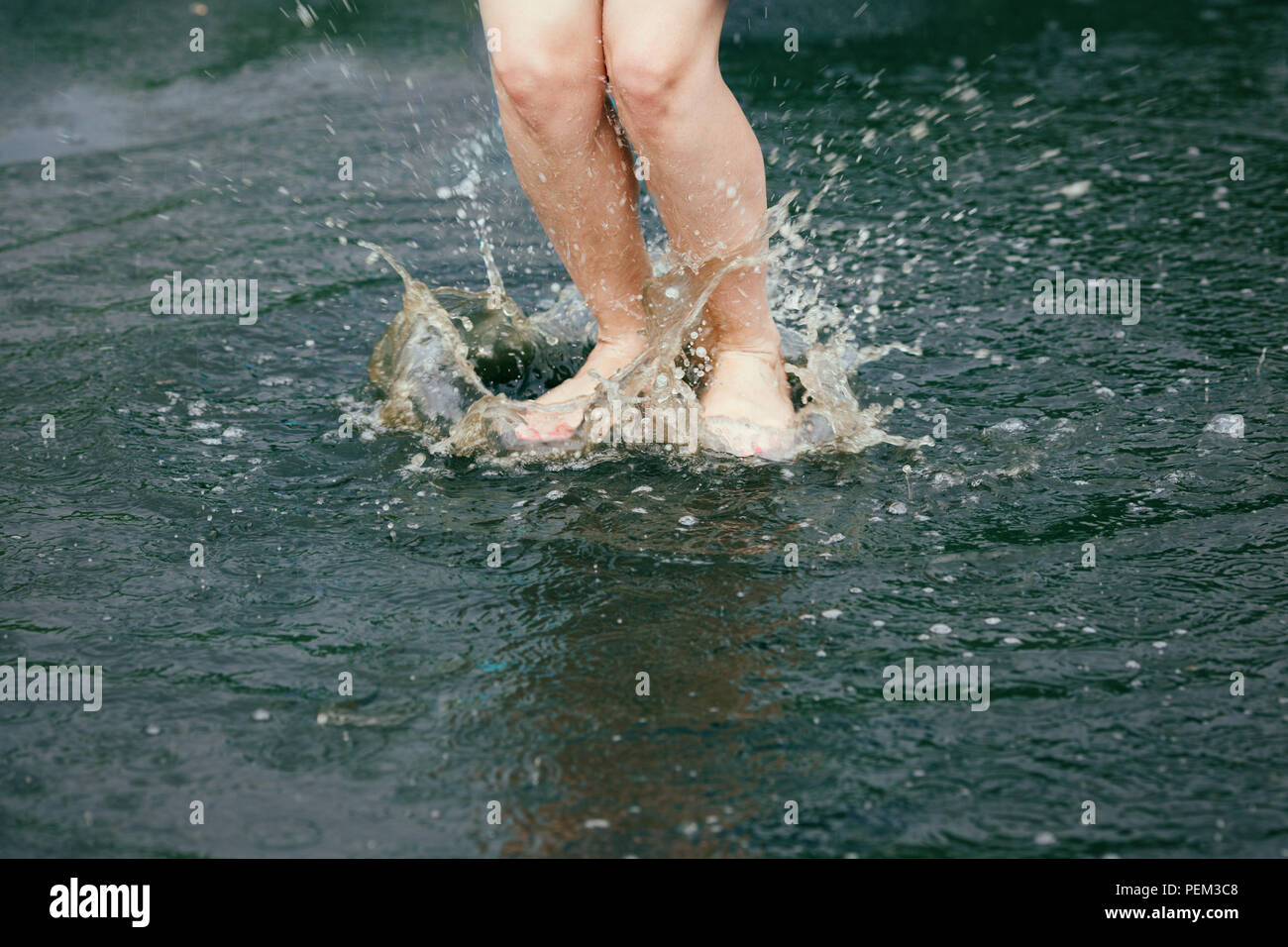 Splash Puddle Adult High Resolution Stock Photography and Images - Alamy