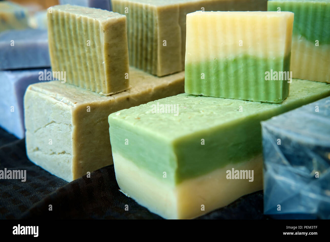 Columns and rows of various colorful homemade bar soaps Stock Photo - Alamy