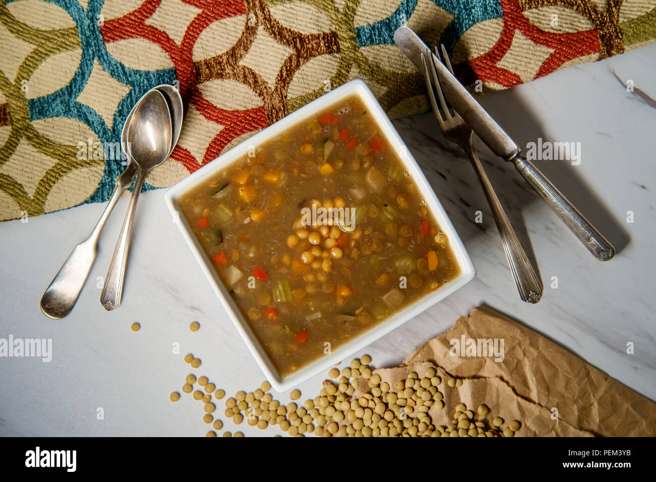 Oven roasted vegetable lentil soup in square shaped bowl Stock Photo ...
