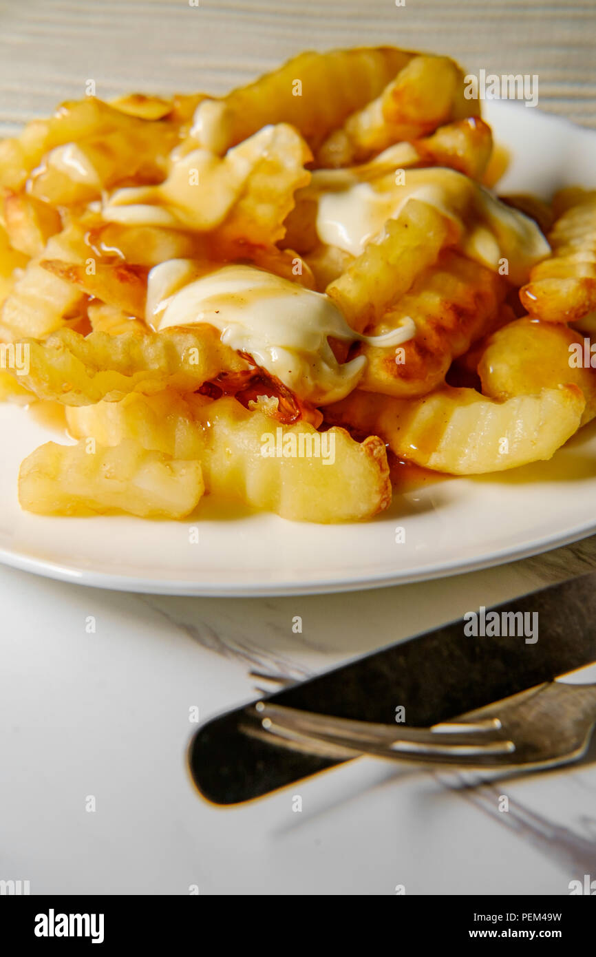 Poutine beef gravy hi-res stock photography and images - Alamy