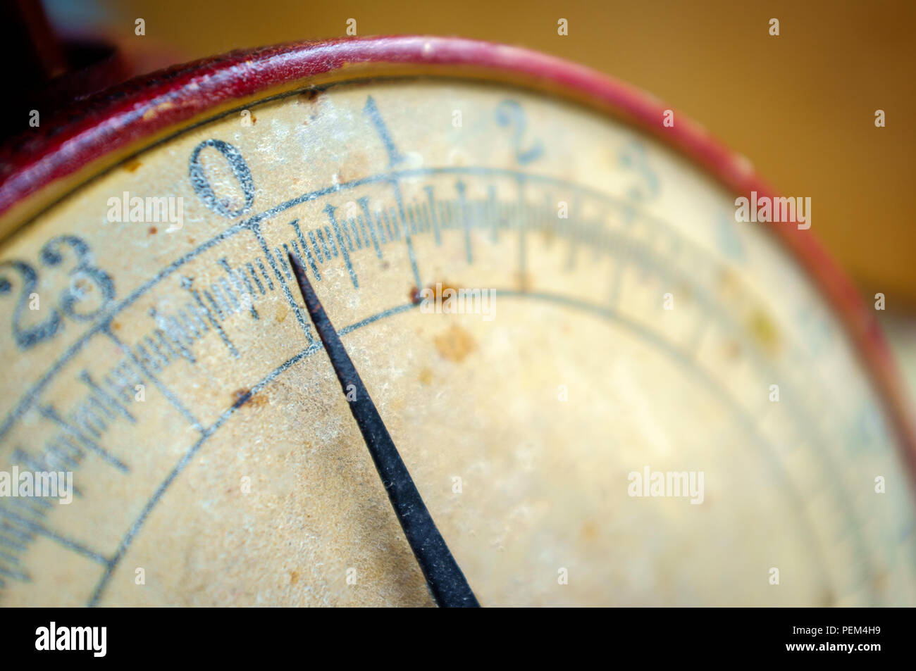 Old fashioned red antique weight measuring scale Stock Photo - Alamy