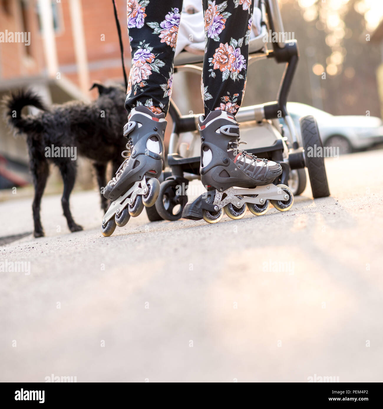Woman rollerblading outside hi-res stock photography and images - Alamy