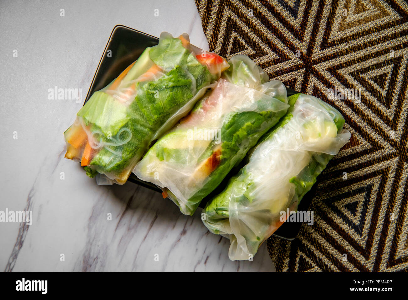 Colorful fresh homemade Vietnamese vegetarian spring rolls Stock Photo ...