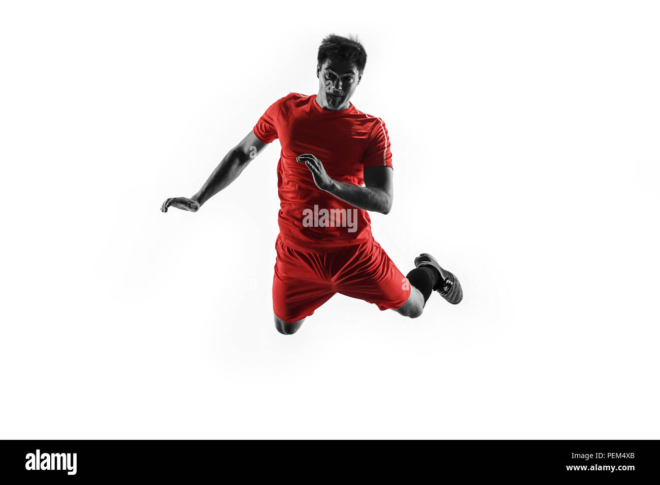 Professional football soccer player in motion isolated on white studio ...