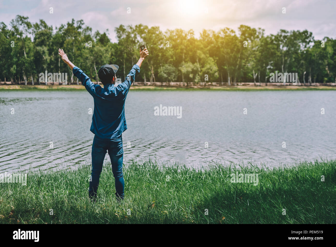 Man blue shirt are using smartphone by internet online,Technology ...