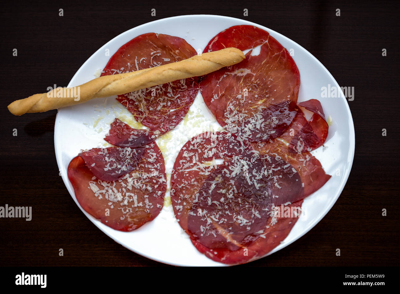 Bresaola, an Italian dish of raw beef cured by salting and air-drying ...