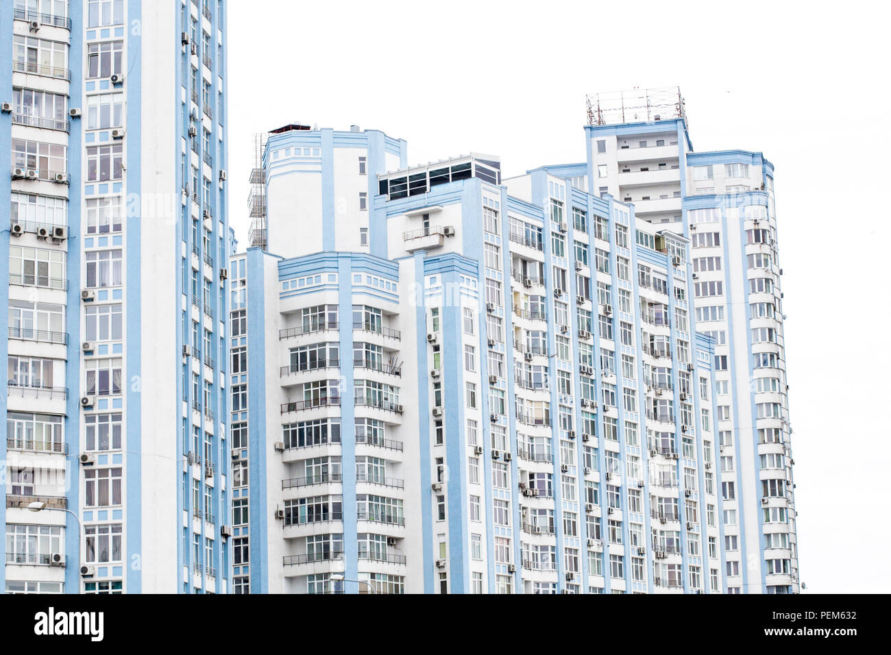 Blue high-rise building. Multi-storey new building Stock Photo - Alamy