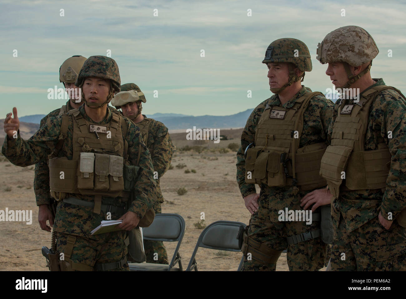 U.S. Marine Corps Maj. Sungwook Kim, left, 5th Marine Regiment ...