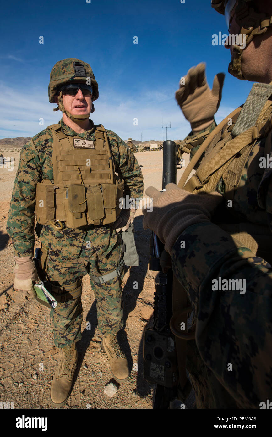 U.S. Marine Corps Lt. Col. Brian Greene, right, 2nd Battalion, 4th ...