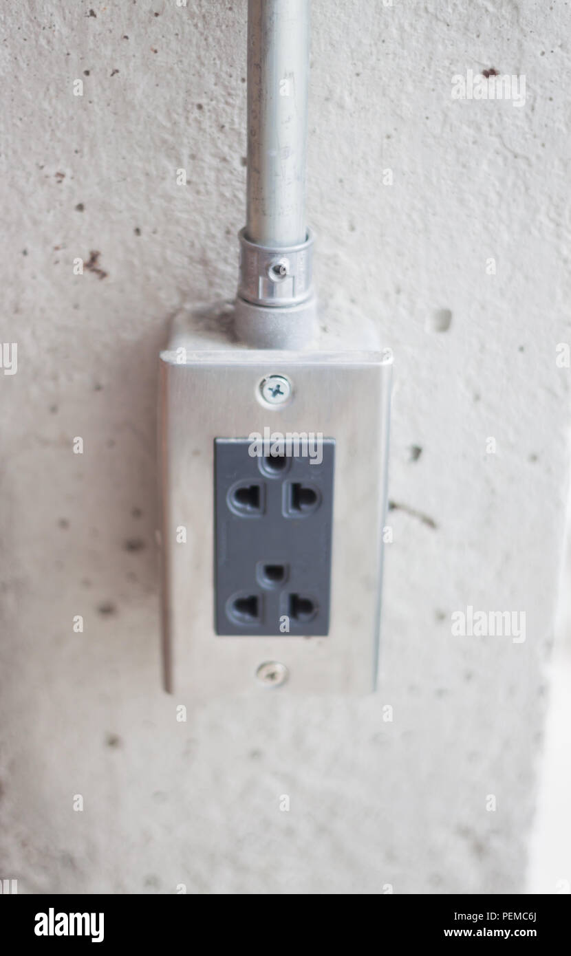 Power socket on concrete wall, stock photo Stock Photo - Alamy