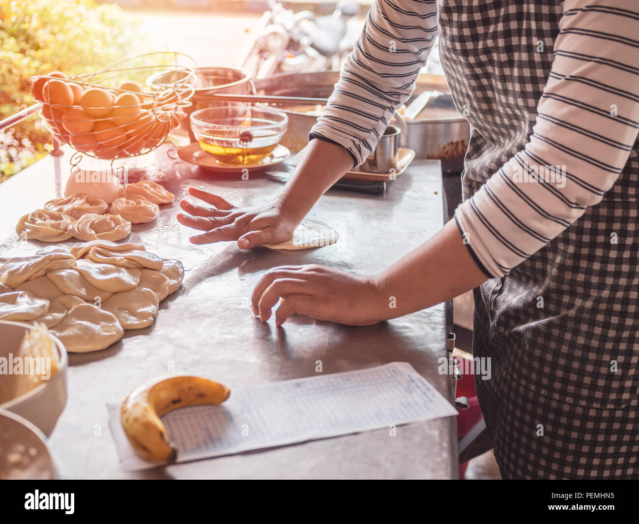 Roti Making, roti thresh flour by roti maker with egg, banana and oil ...