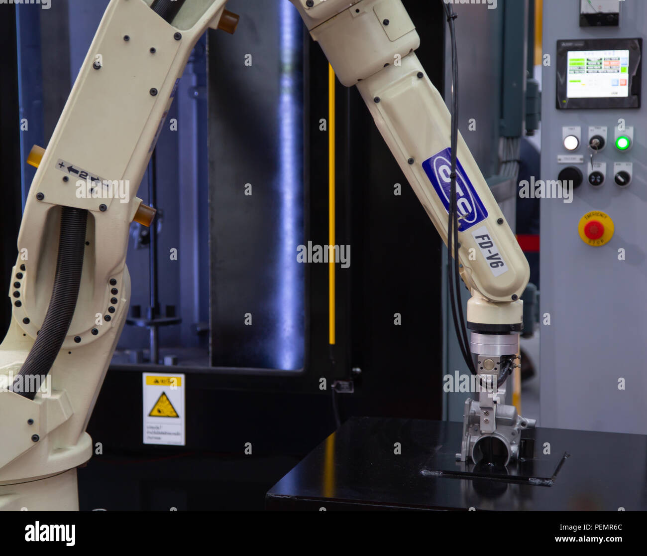 Bangkok, Thailand - June 20, 2018: Robot arm perform loading ...