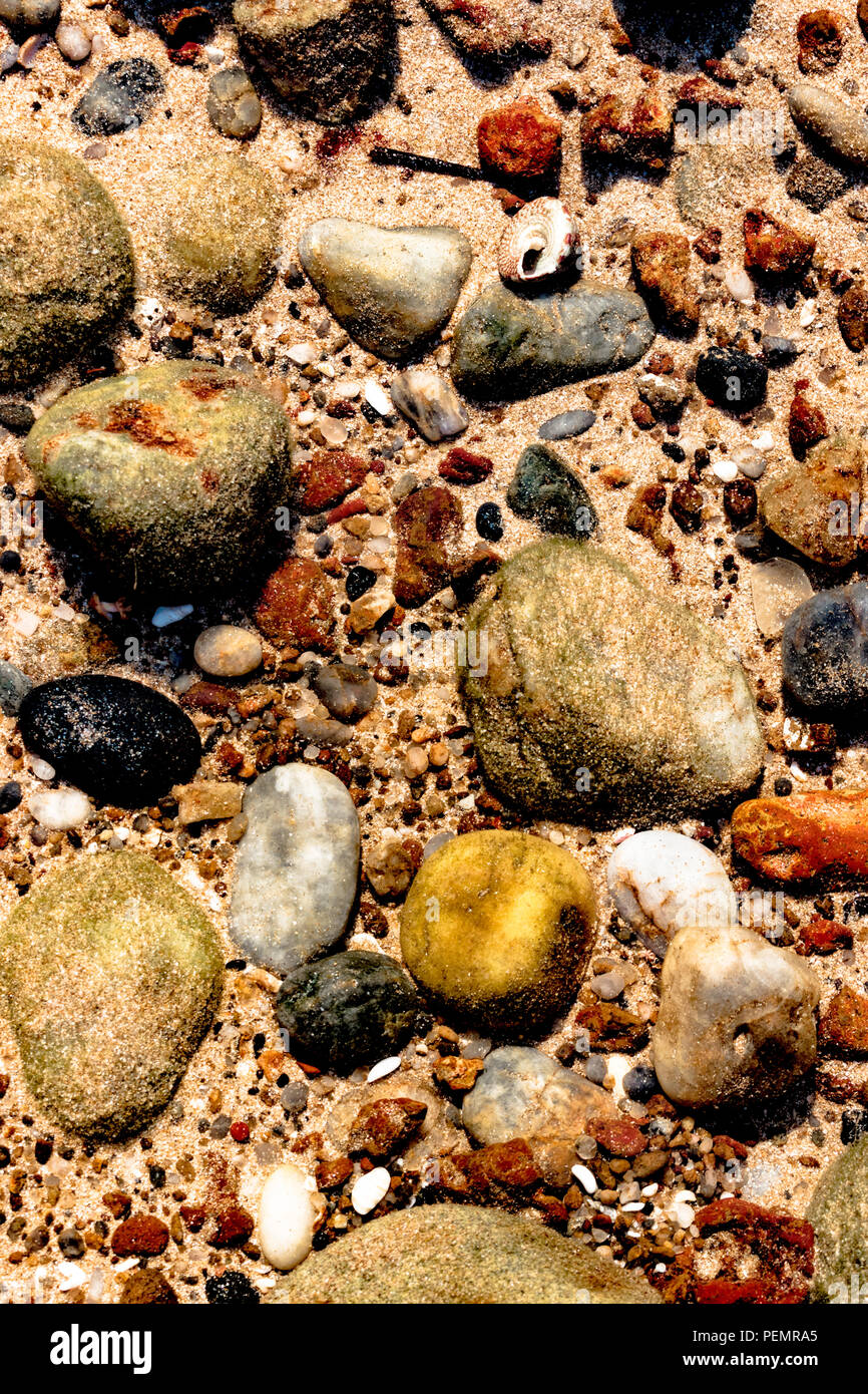 Beautiful colorful stones, sea shells and geological rocks containing ...