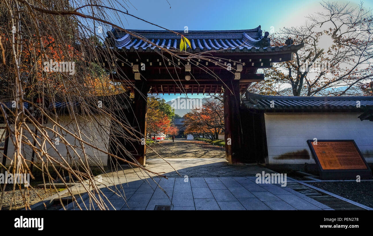 Kyoto, Japan - Nov 18, 2016. Wooden gate of Shinto Shrine in Kyoto ...