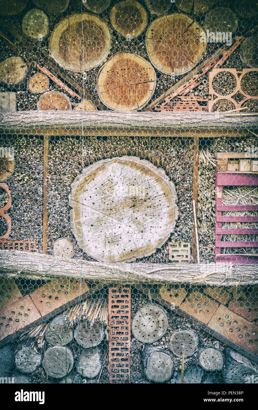 Insect hotel in park. Natural scene. Detailed photo. Analog photo ...