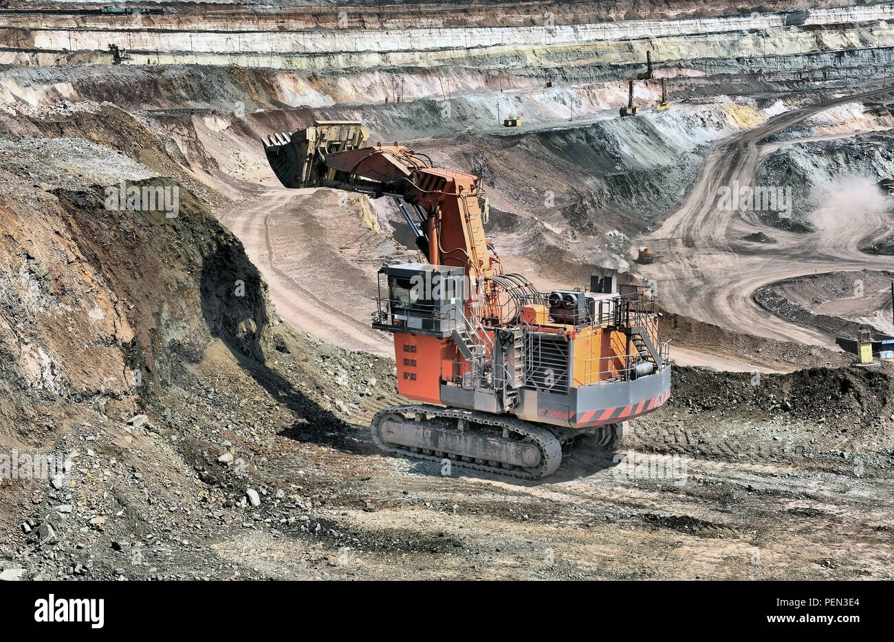 The big dredge digs the earth Stock Photo - Alamy