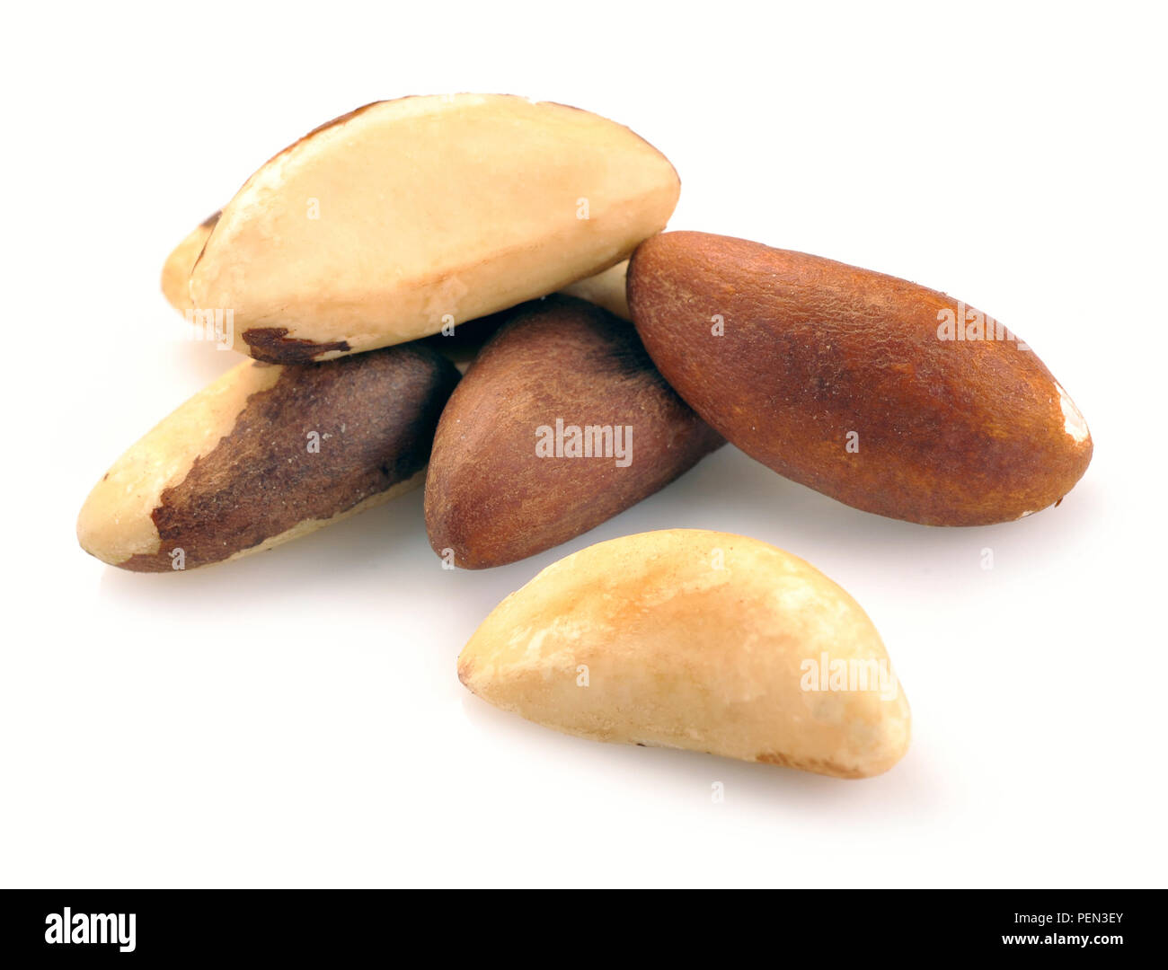 Brazil nuts close-up isolated on white background Stock Photo - Alamy