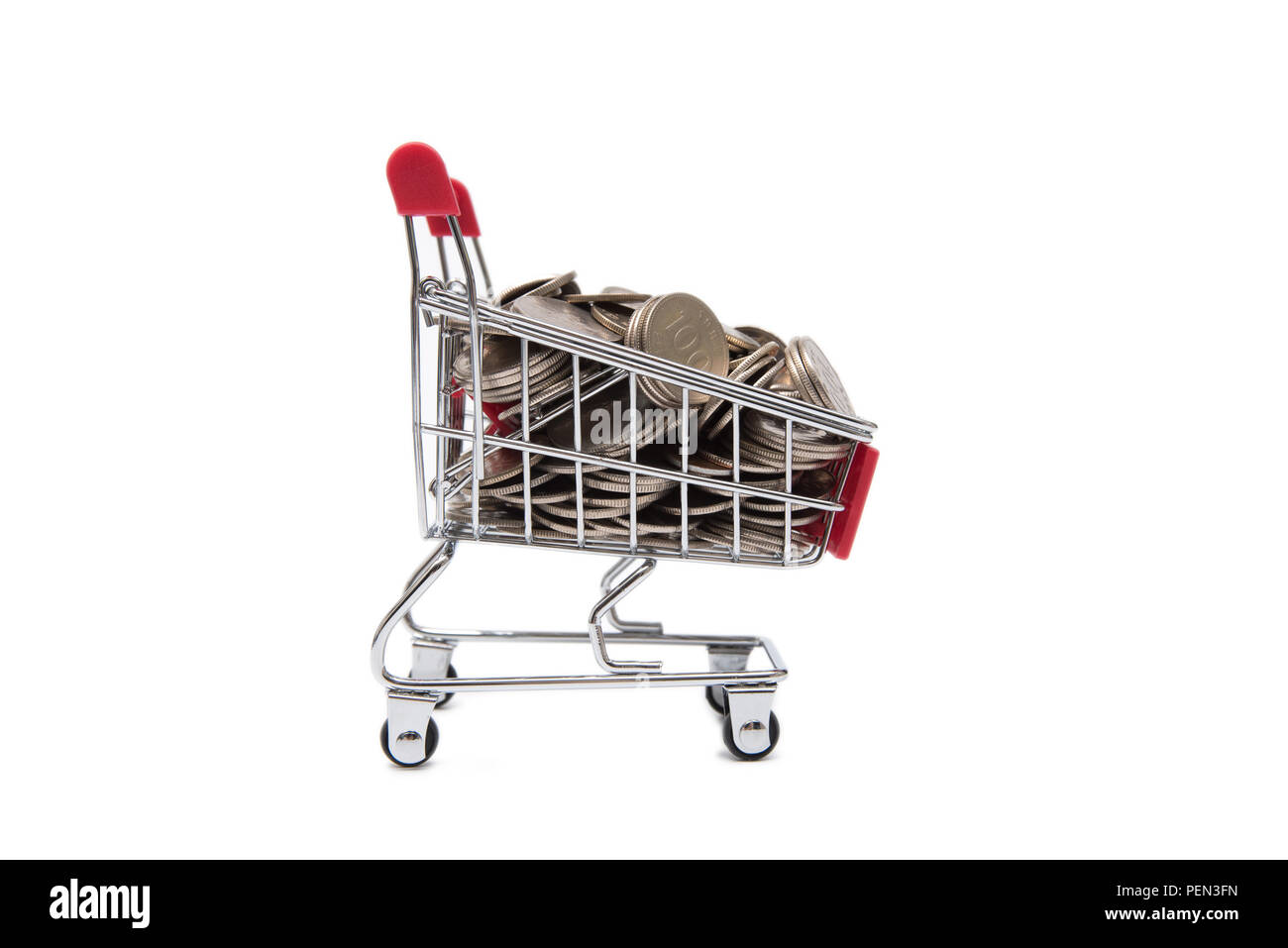 Shopping cart full of coin on white background Stock Photo - Alamy