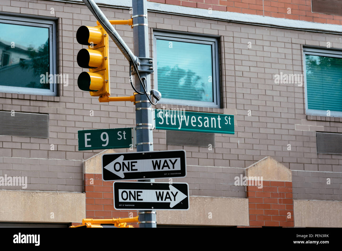 Road sign, one way signs and traffic lights in New York City Stock ...