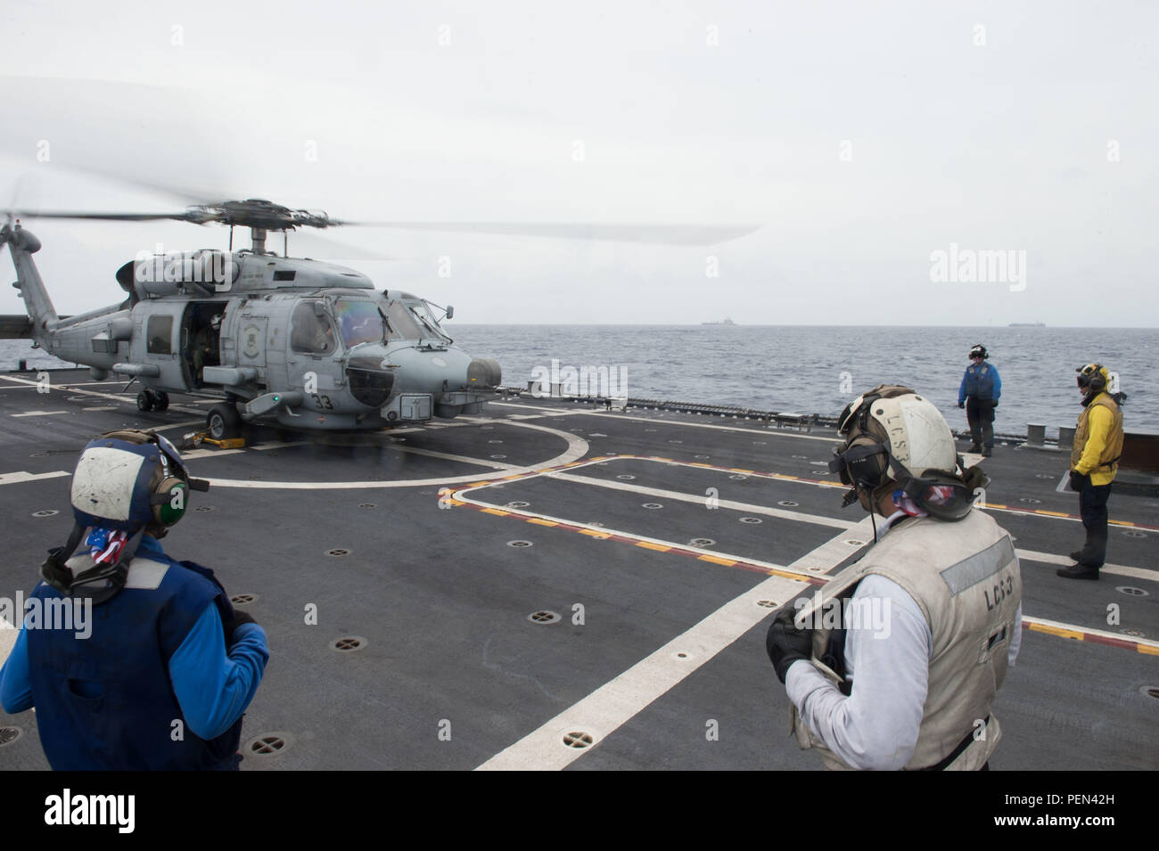 SOUTH CHINA SEA – (Dec. 16, 2015) – A MH-60R Seahawk helicopter from ...