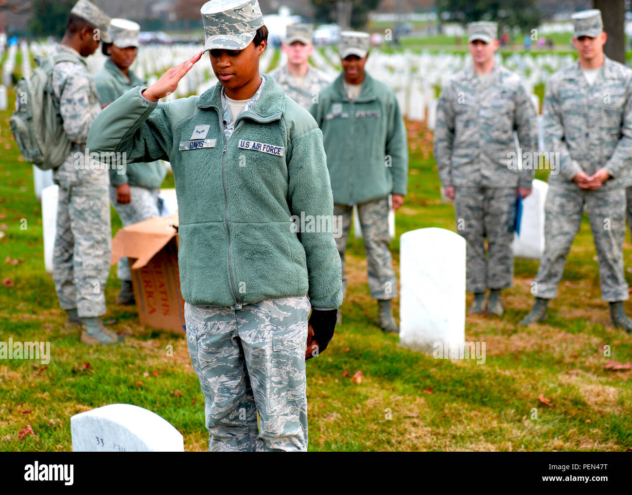 Airman First Class Tiara Davis renders a salute to a fallen guardsman ...
