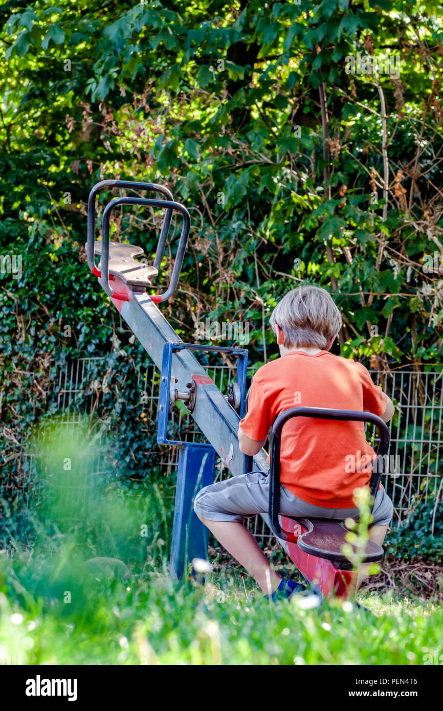 Child sad playground hi-res stock photography and images - Alamy