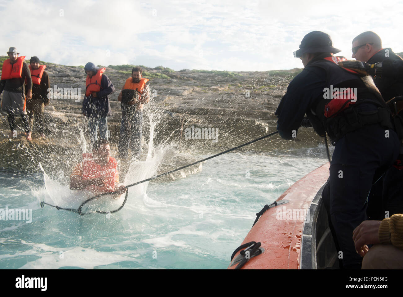 Crewmembers from the Coast Guard Cutter Kathleen Moore rescue Cuban ...