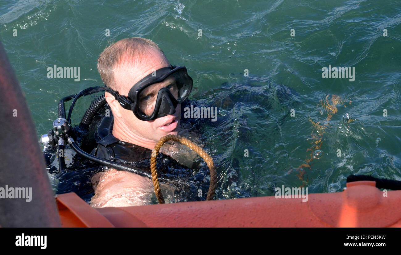 Chief Petty Officer Michael Perrault, a diver with Regional Dive Locker ...