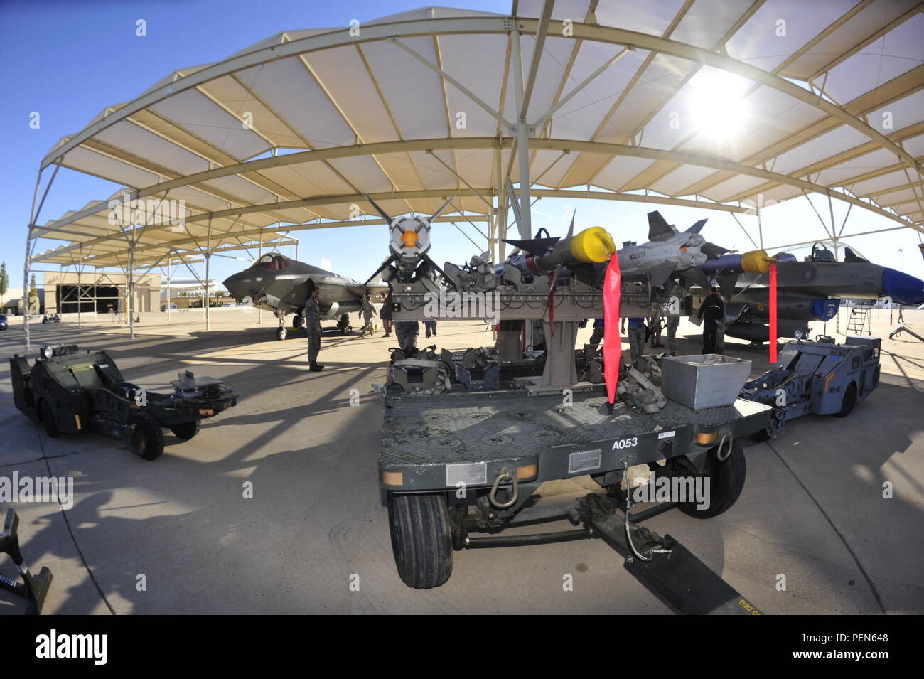 Weapons load crew members from the 61st Aircraft Maintenance Unit ...