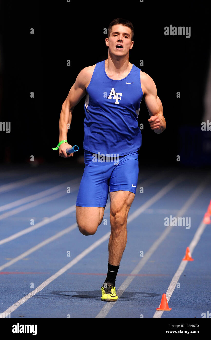 Calvin Berstler, a sophomore, runs a leg of the mile relay during the ...