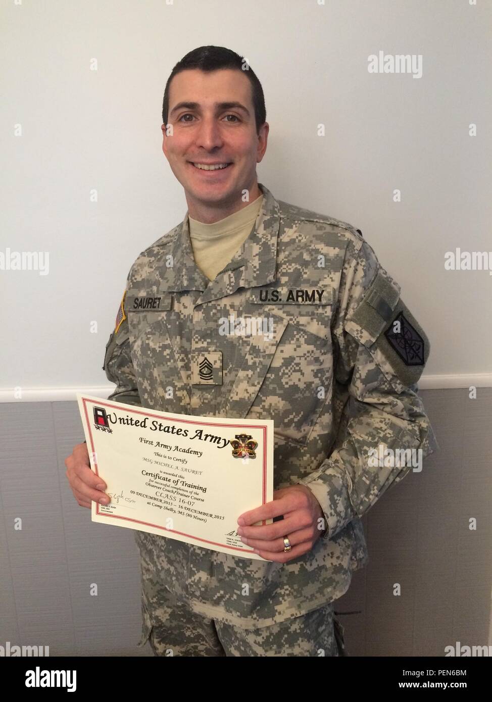 Master Sgt. Sauret proudly displays his First Army Observer Coach ...