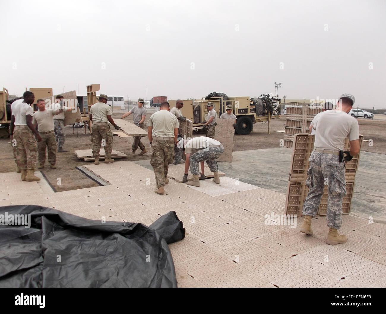 Soldiers assigned to U.S. Army Central’s Contingency Command Post lay ...