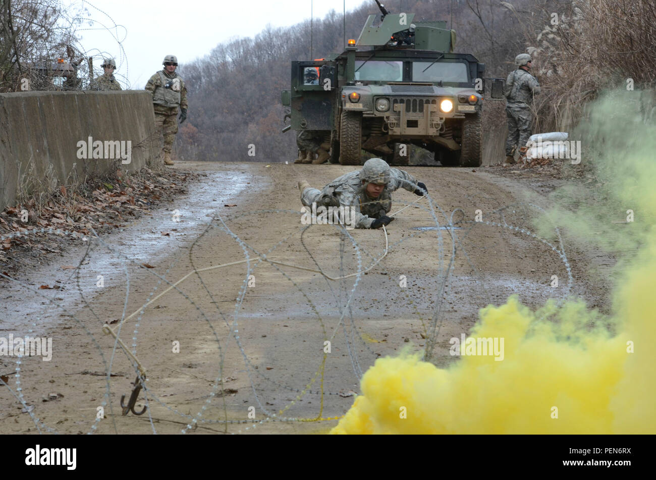 An engineer from the 8th Brigade Engineer Battalion, 2nd Armored ...