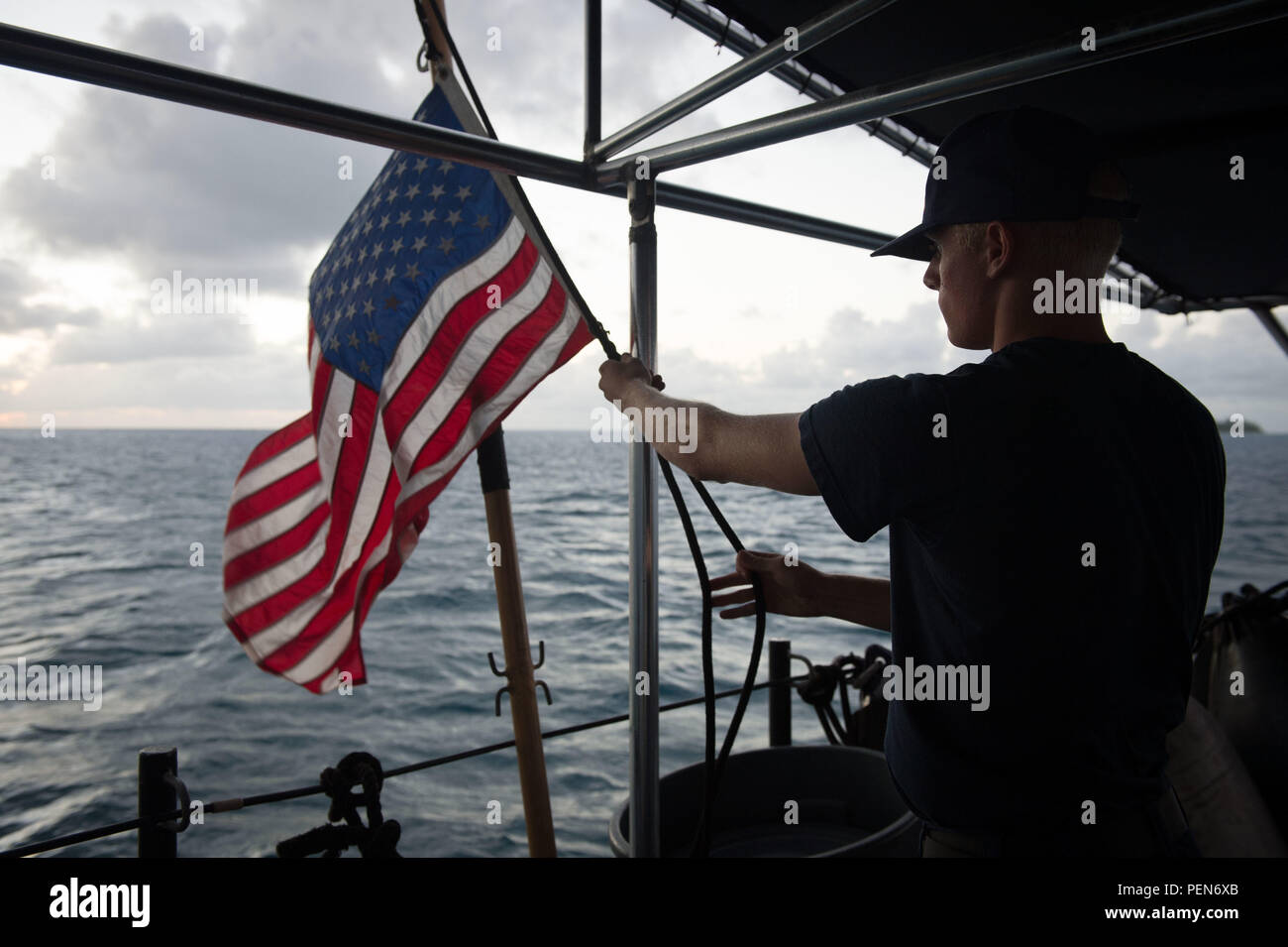 Coast Guard Seaman Hayden Oliver, assigned to U.S. Coast Guard Cutter ...