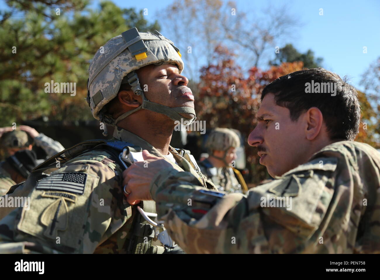 U.S. Army 1st Sgt. Endesha Johnson, assigned to 55th Signal Company (Combat Camera), receives a ...